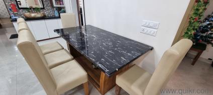 Selling My Dining Table 5 seater...Segun wood with Italian marble ...