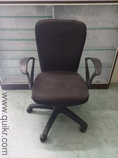 Black coloured Revolving Office chair with good cusion with height ...