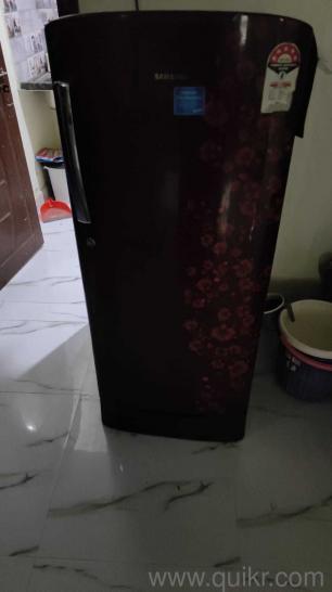 Well conditioned fridge for sale, it is samsung brand with maroon color ...