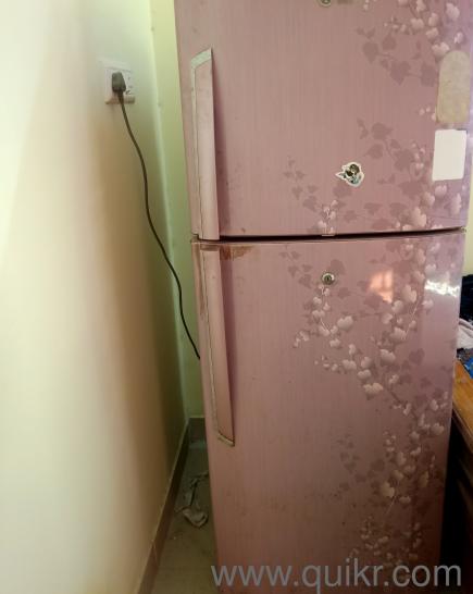 LG double door pink colour flower model double door fridge. Working in ...