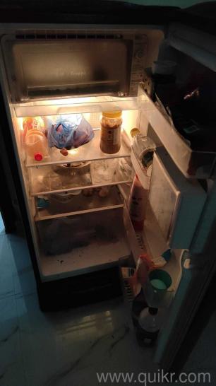Well conditioned fridge for sale, it is samsung brand with maroon color ...