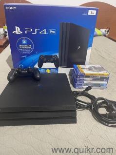 98732..73716 sony playstation ps4 pro 1tb with 2 controller and 4 ...