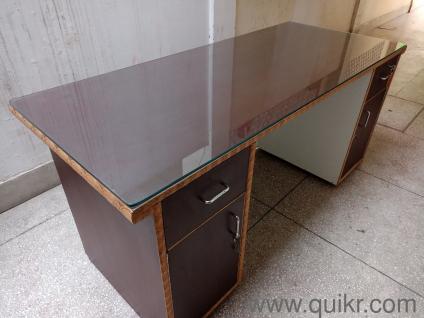 Office table with glass top and sethi with cushion seat. Table size 6ft ...