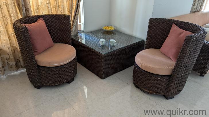 Elegant center table with glass top and Comfortable Seating arm chairs ...
